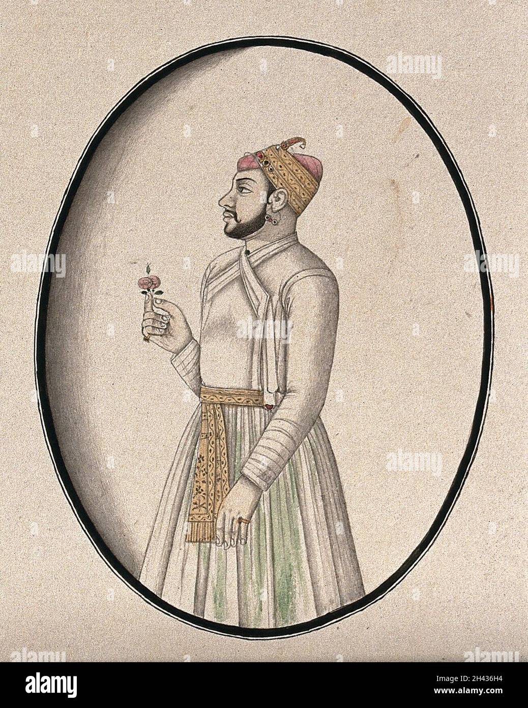 A Mughal courtier holding a flower. Watercolour drawing by an Indian ...
