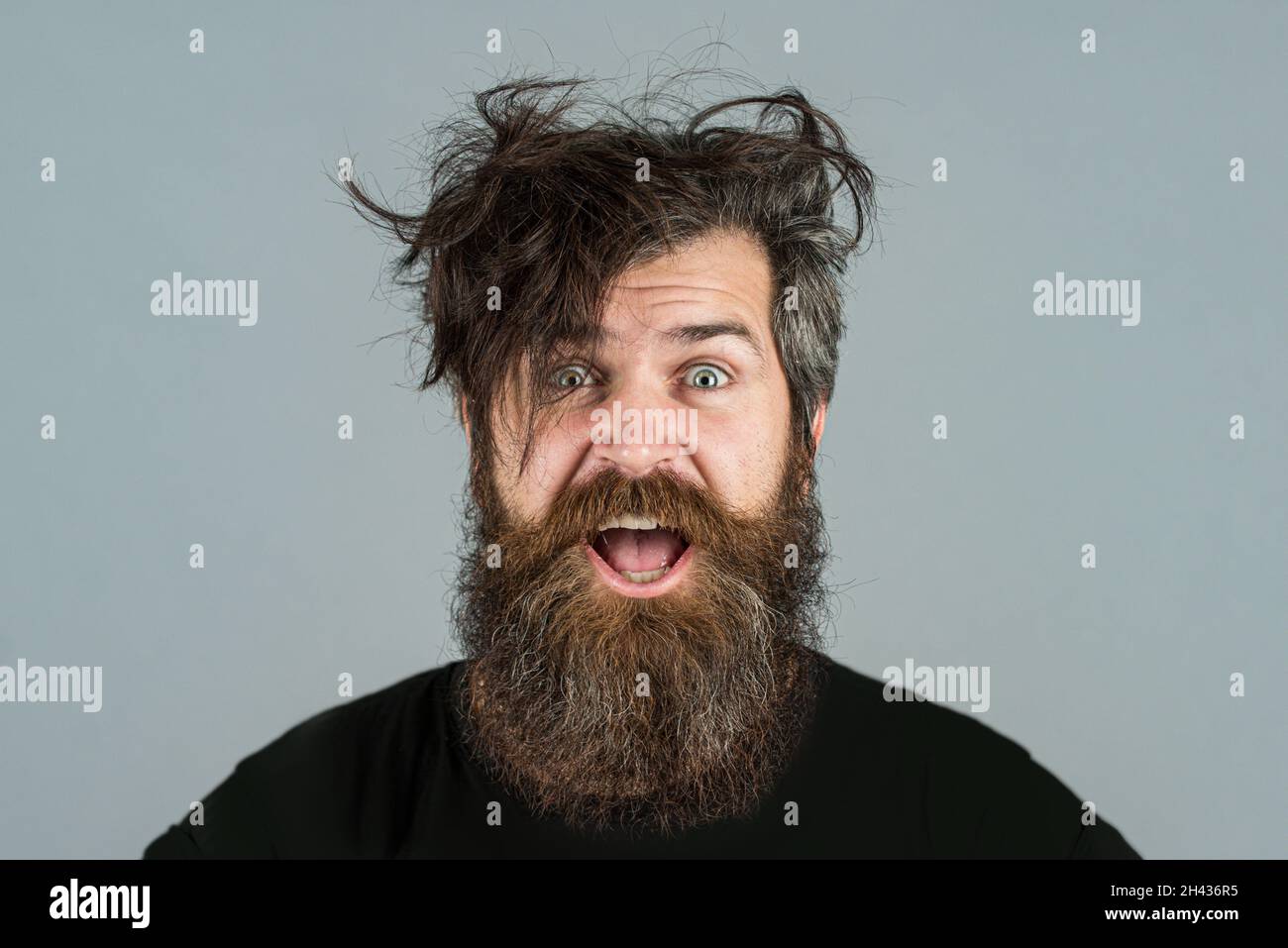 Surprised handsome man. Shocked male model with surprise expression ...