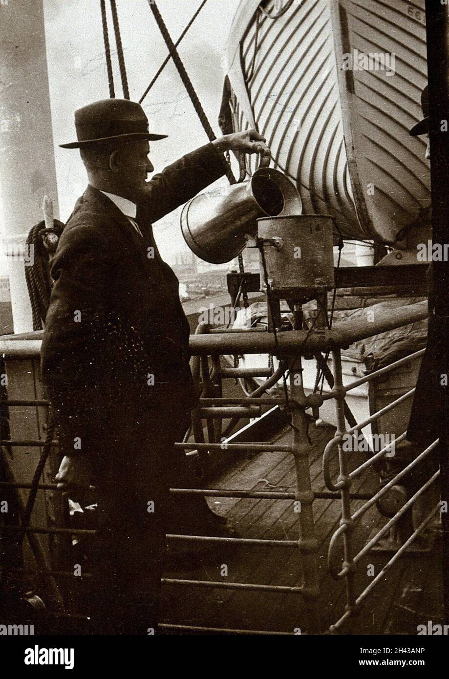 Ship fumigation using hydrogen cyanide: an operator pouring cyanide ...