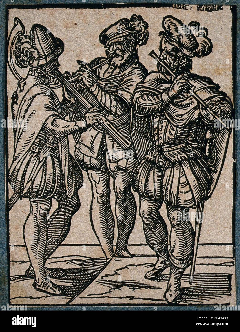Three men in minstrel's dress play their instruments. Woodcut Stock ...