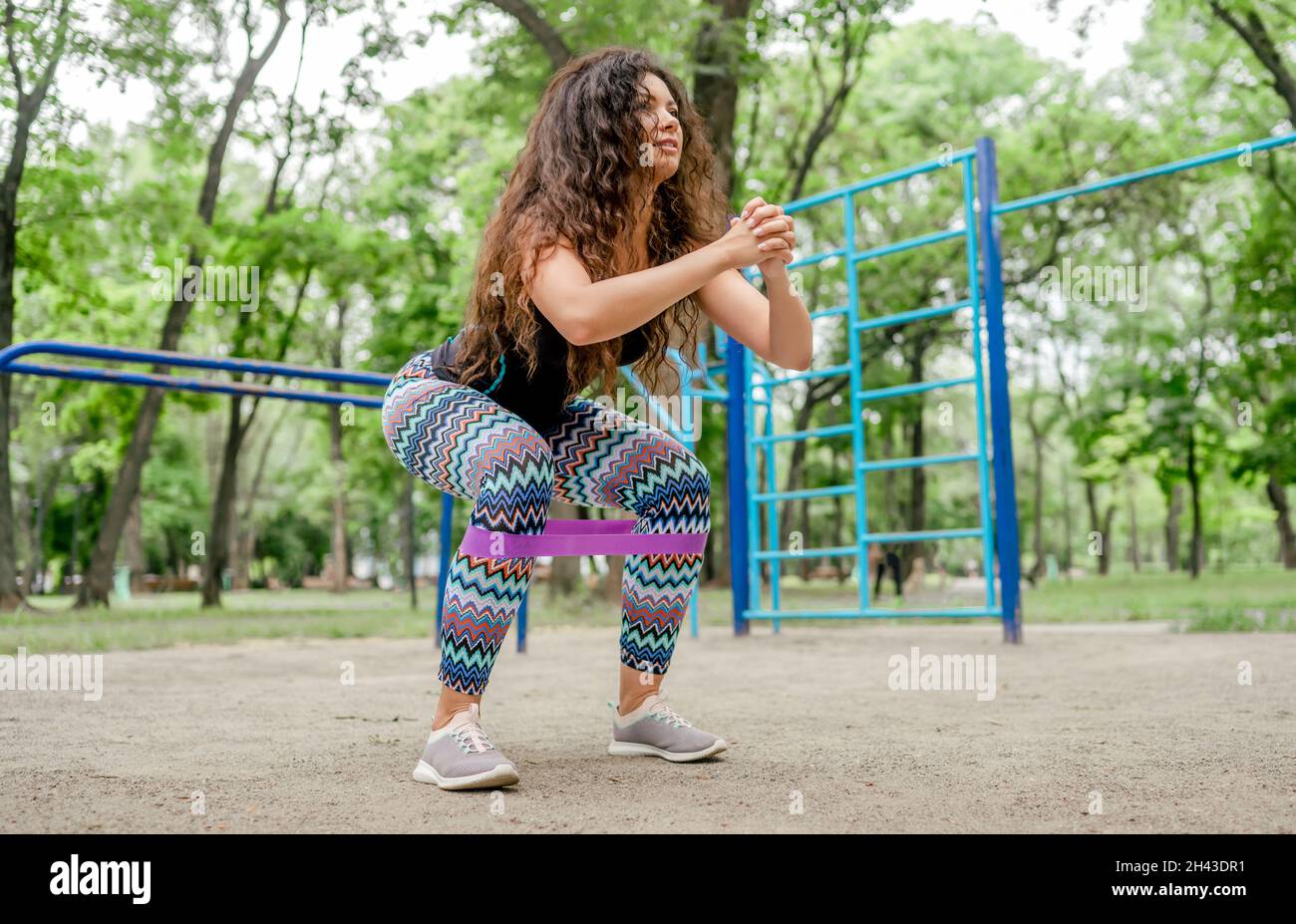 Girl exercising outdoors Stock Photo - Alamy