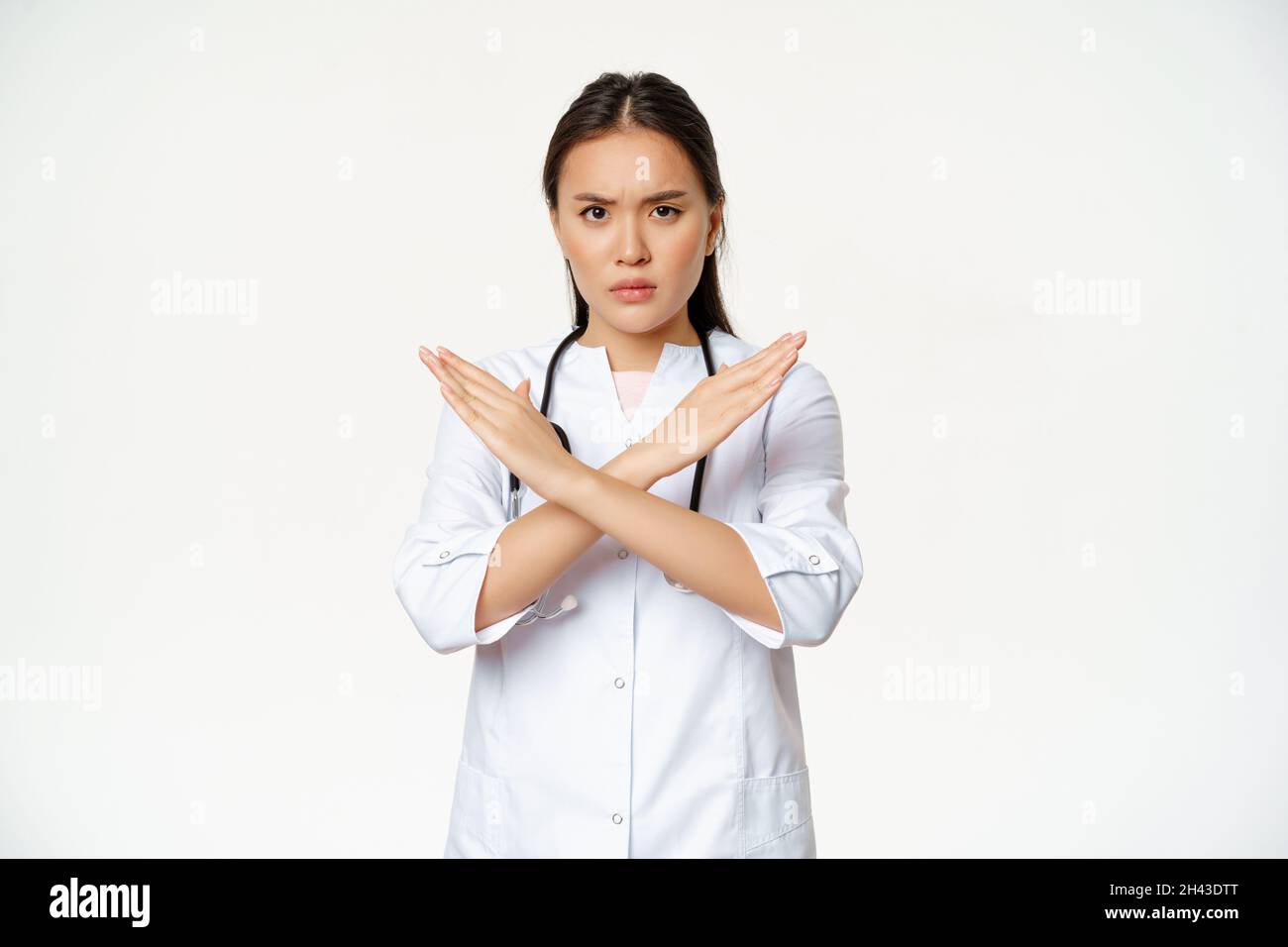 Serious asian woman doctor prohibit patient behaviour, showing stop ...