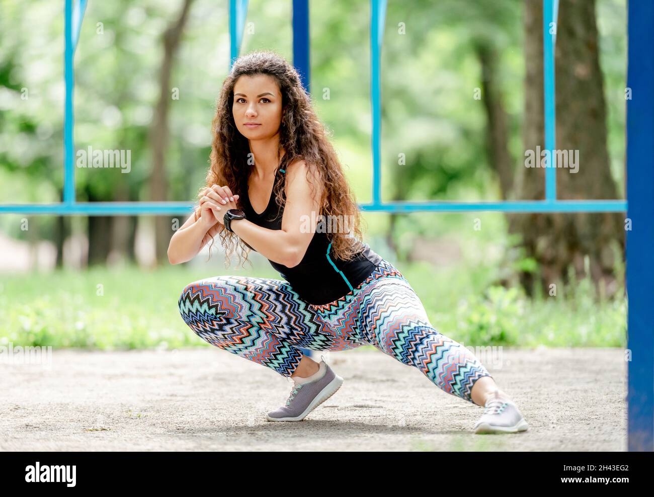 Girl exercising outdoors Stock Photo - Alamy