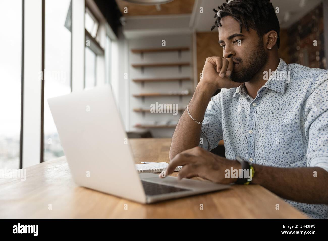 Pensive african american app hi-res stock photography and images - Alamy