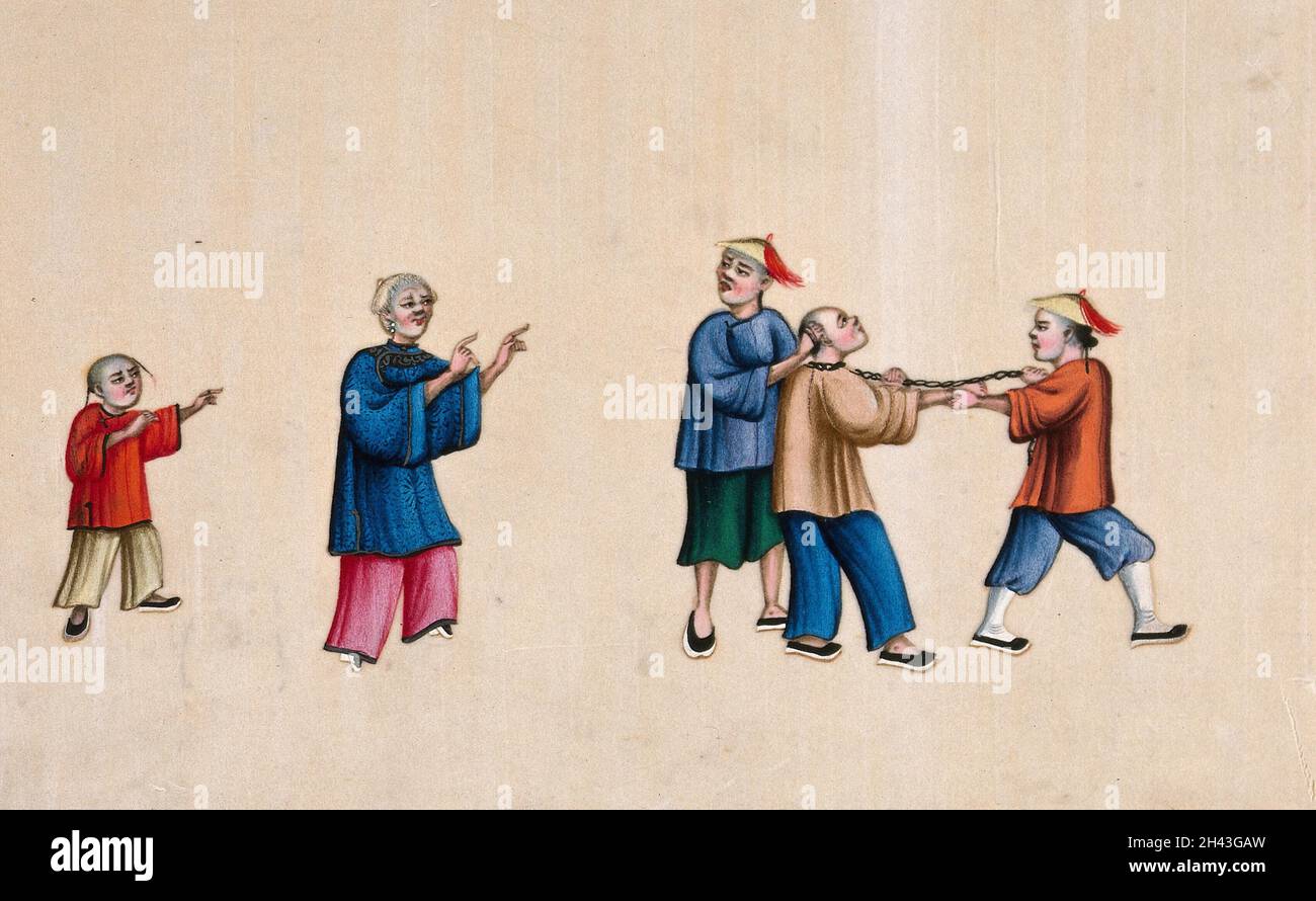 A Chinese man being taken prisoner: a man is shown being led away by ...