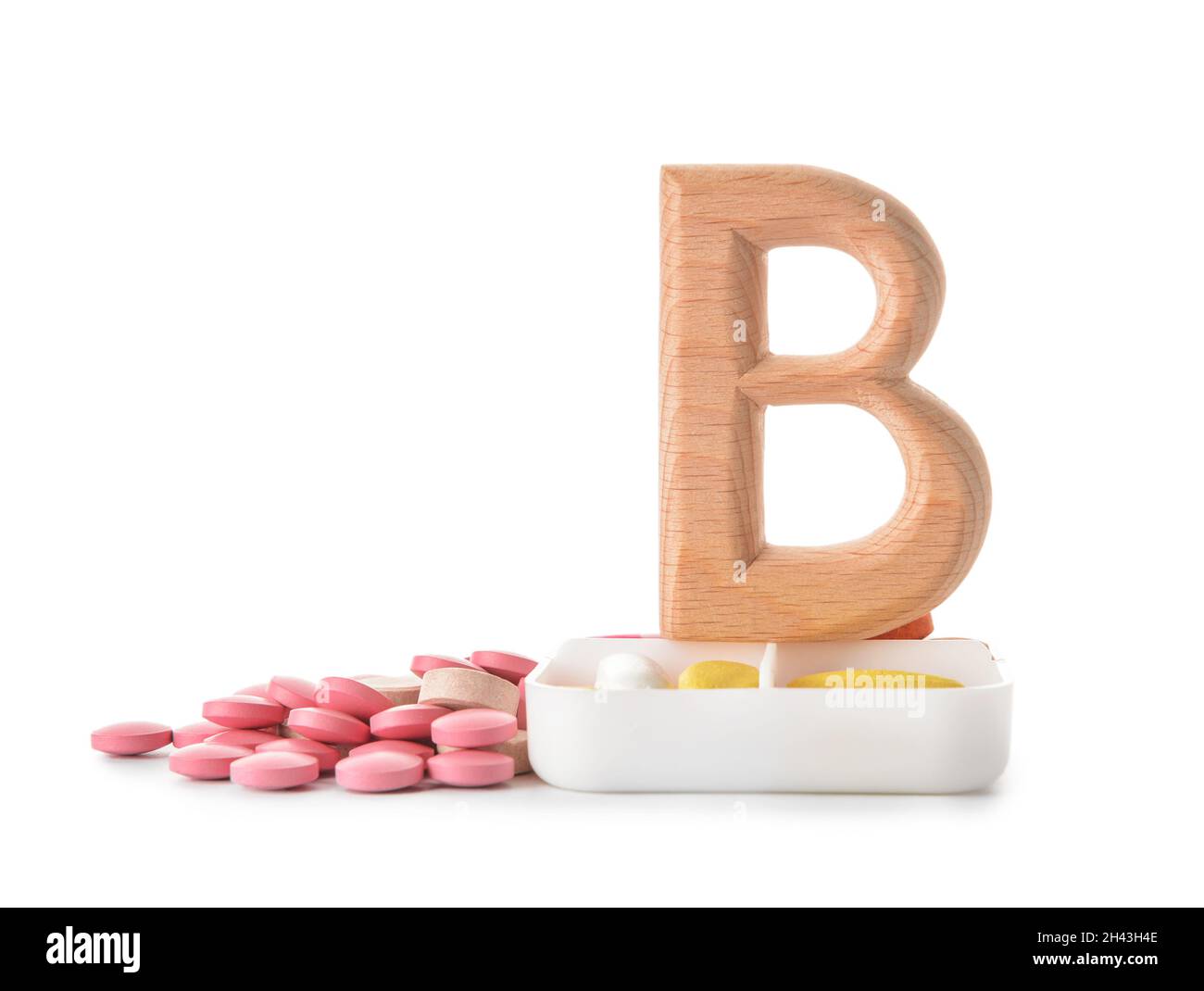 Vitamin B pills on white background Stock Photo - Alamy
