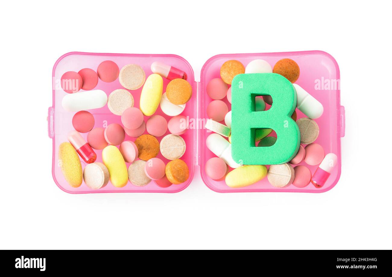 Vitamin B pills on white background Stock Photo - Alamy