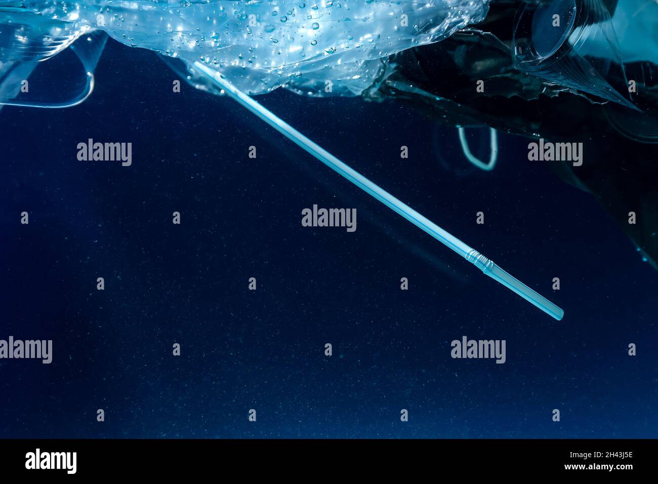 Plastic garbage floating in ocean Stock Photo - Alamy