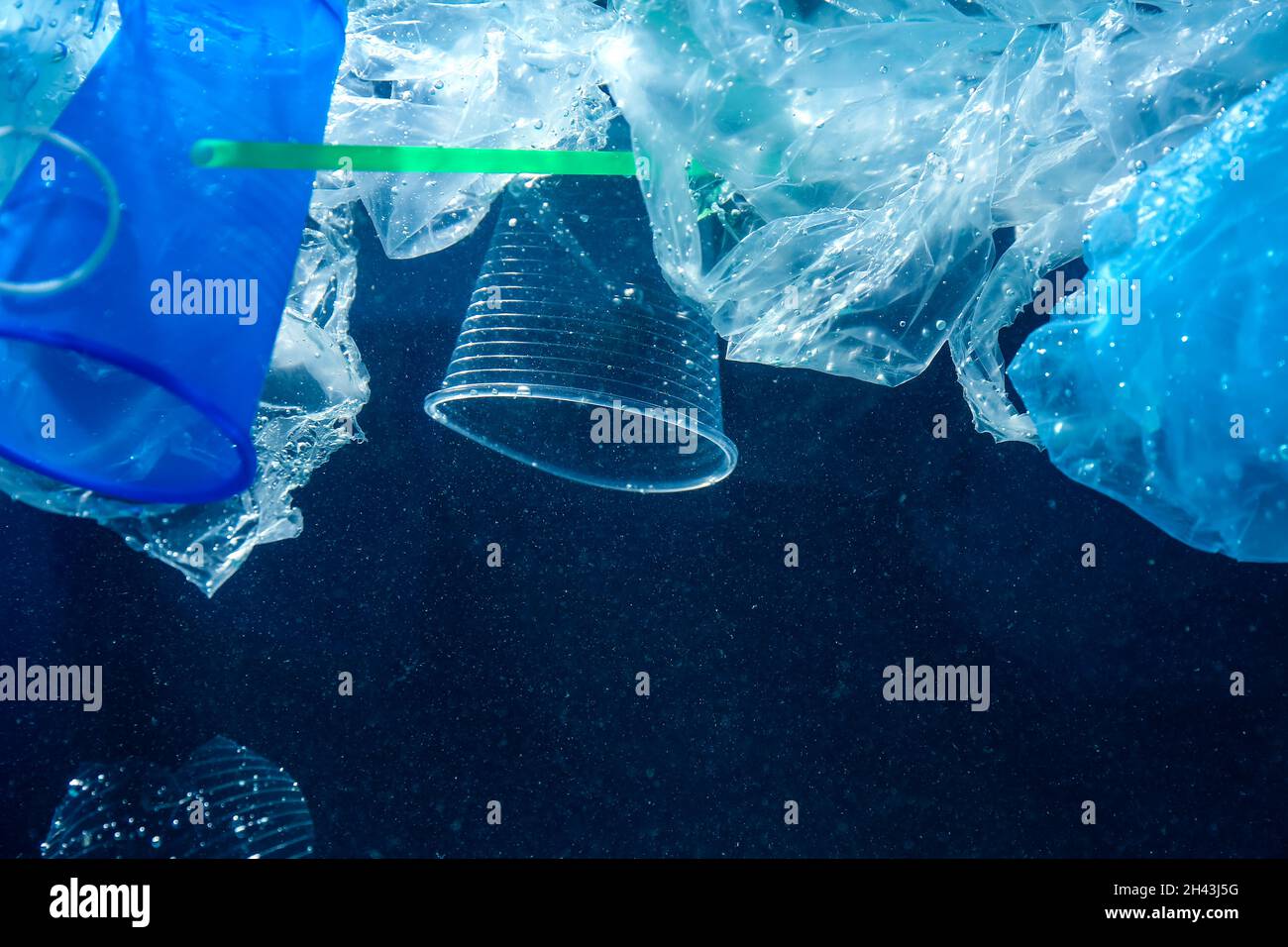 Plastic garbage floating in ocean Stock Photo - Alamy