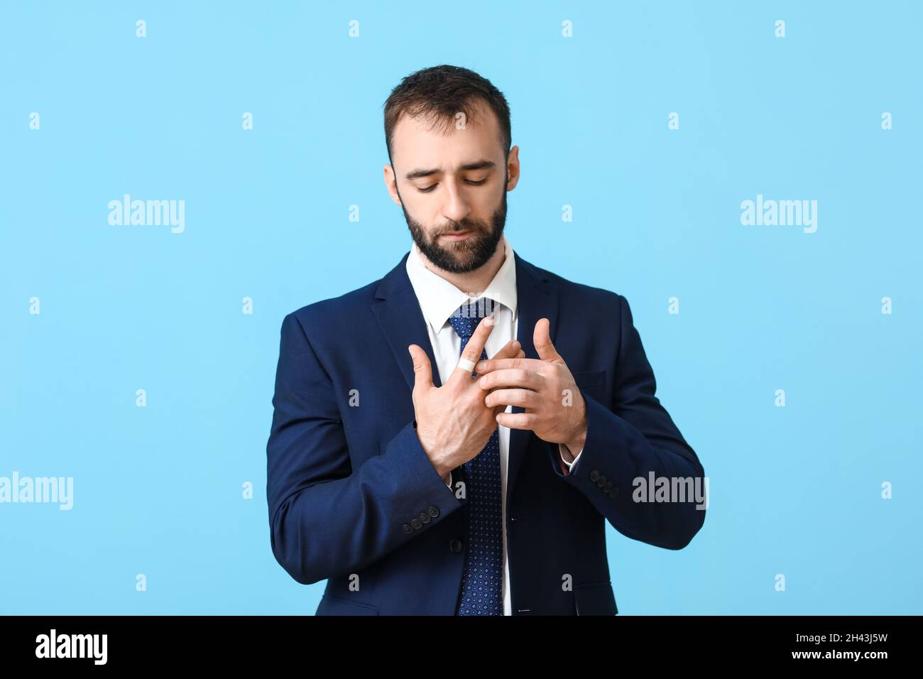 Finger plaster blue hi-res stock photography and images - Alamy