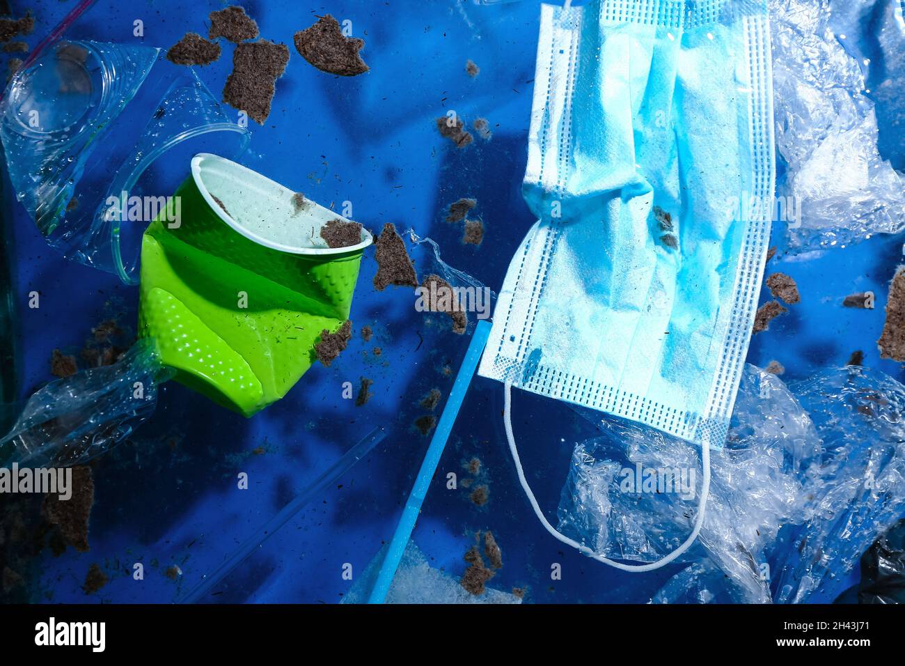 Plastic garbage floating in ocean Stock Photo - Alamy
