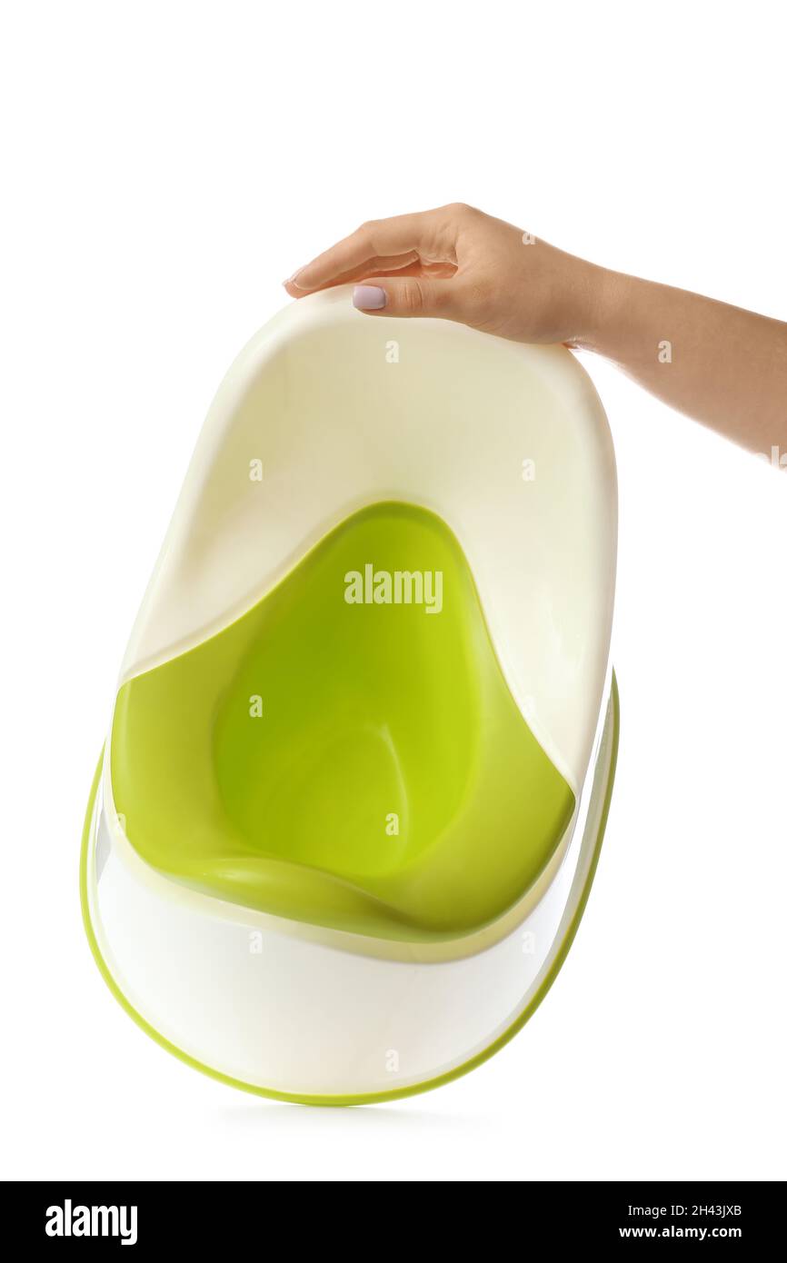 Woman with baby potty on white background Stock Photo - Alamy