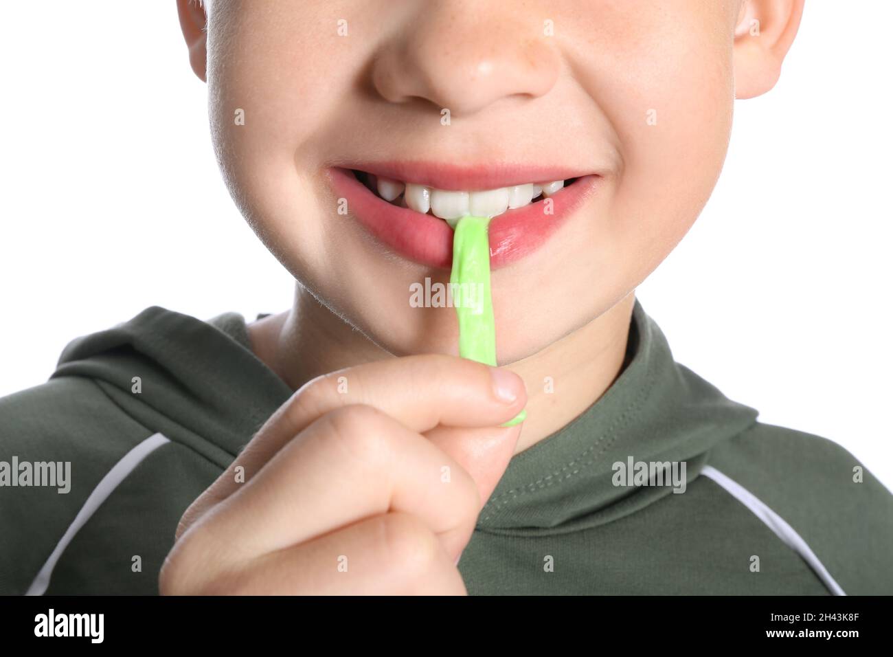 Little boy chewing gum on white background, closeup Stock Photo - Alamy