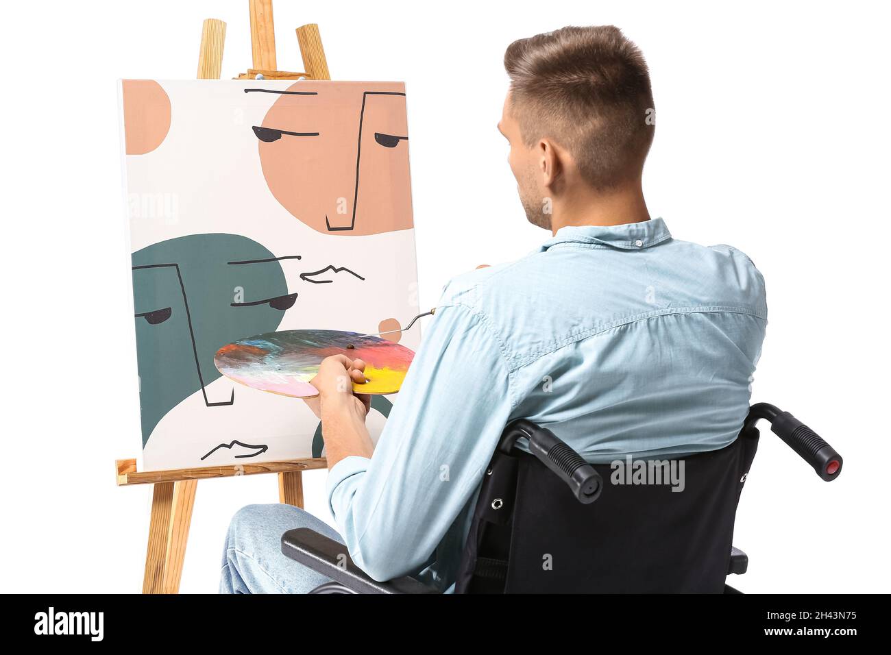 Young handicapped artist painting hi-res stock photography and images ...