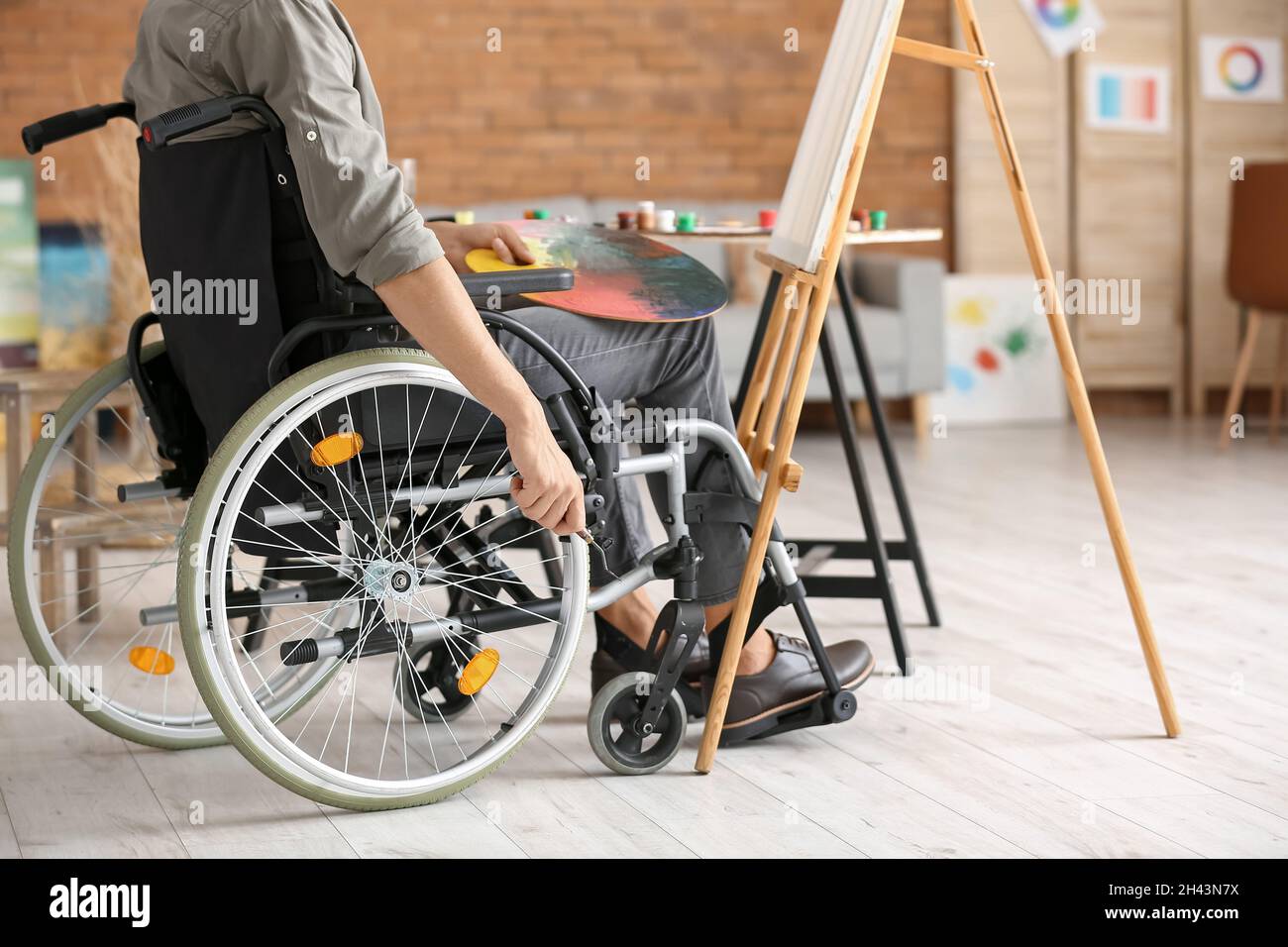 Young handicapped artist drawing hi-res stock photography and images ...