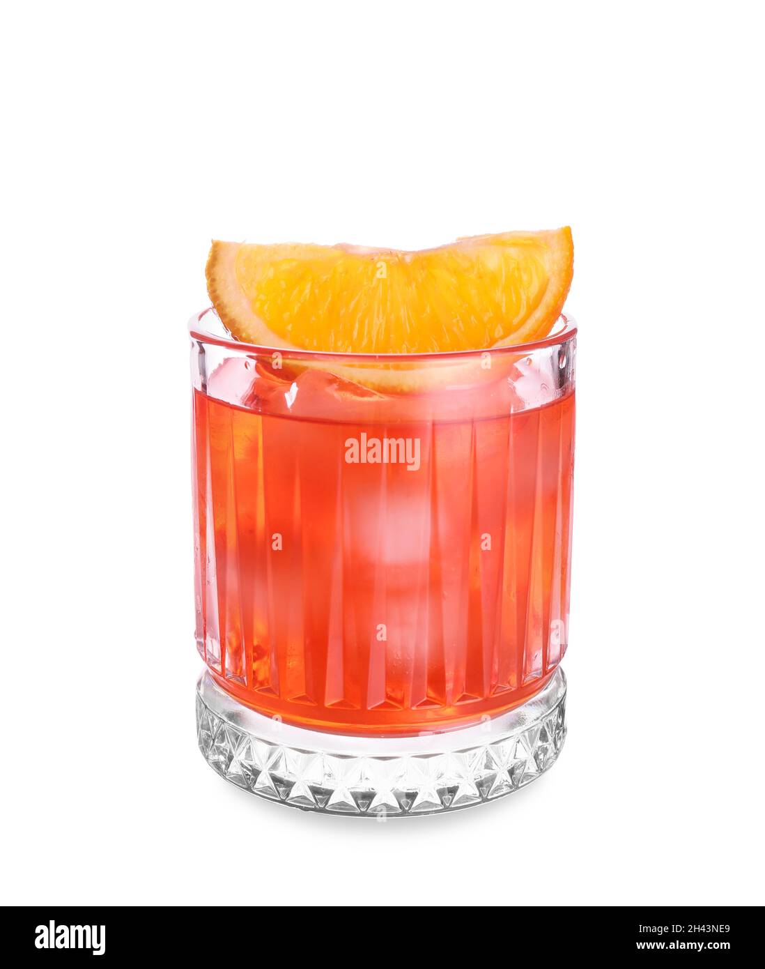 Glass of negroni cocktail with lemon slice on white background Stock ...