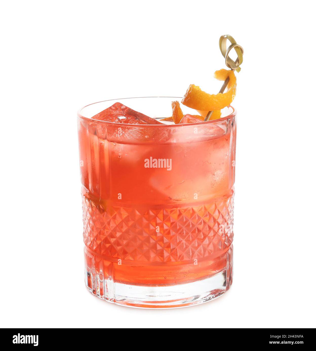 Glass of negroni cocktail with lemon peel on white background Stock ...