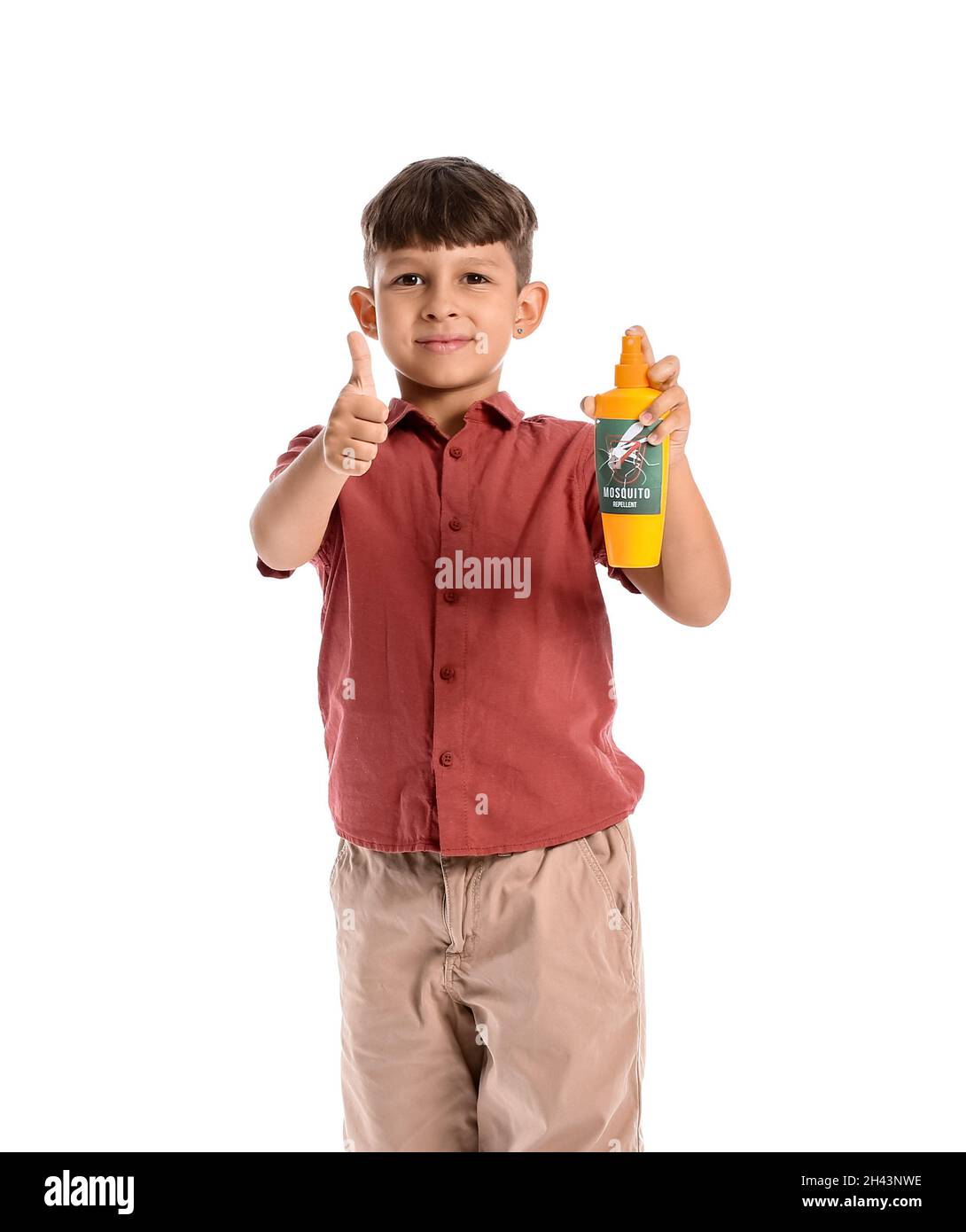 Little boy with mosquito repellent showing thumb-up on white background ...