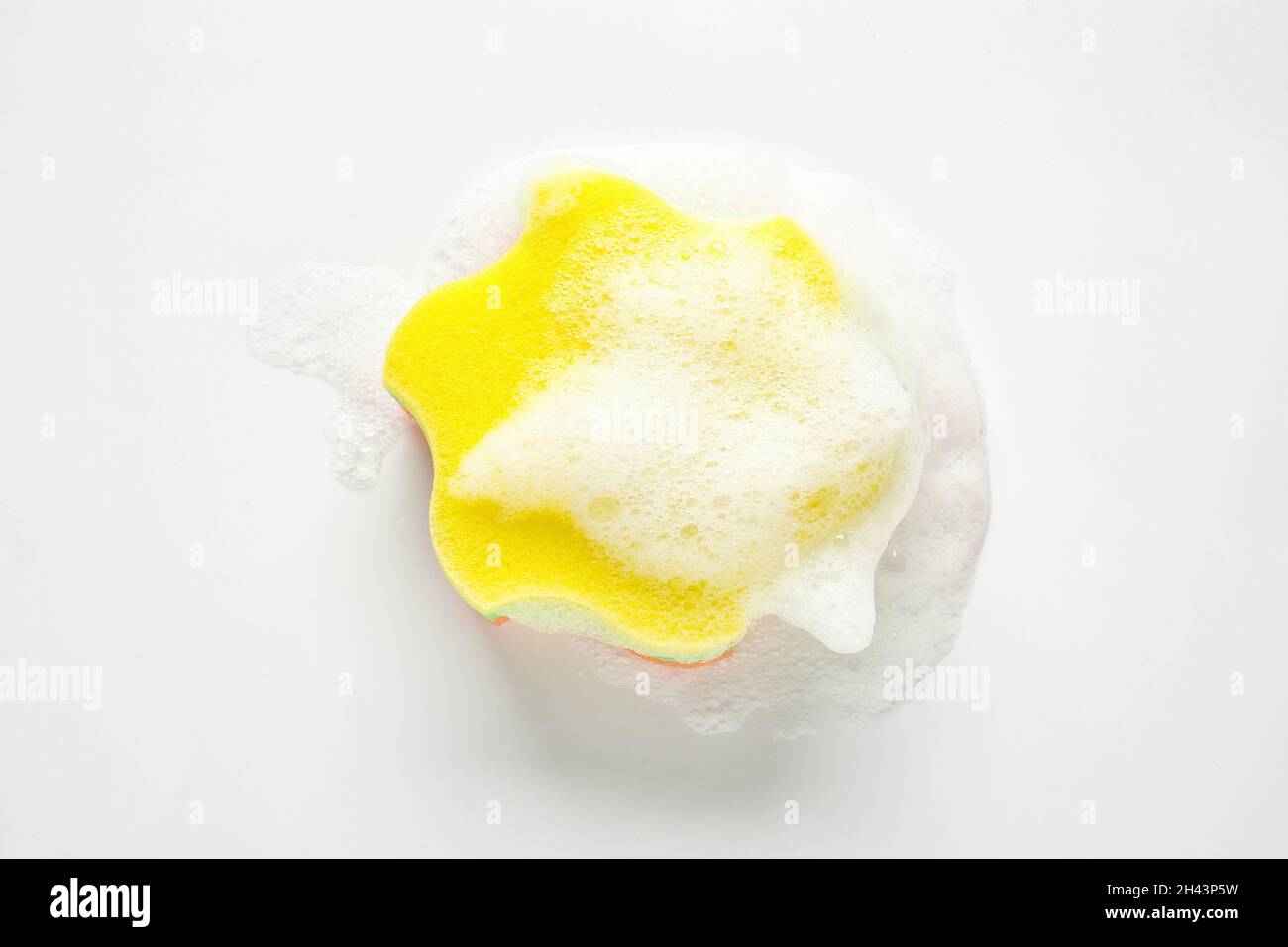Soapy star shaped bath sponge on white background Stock Photo - Alamy