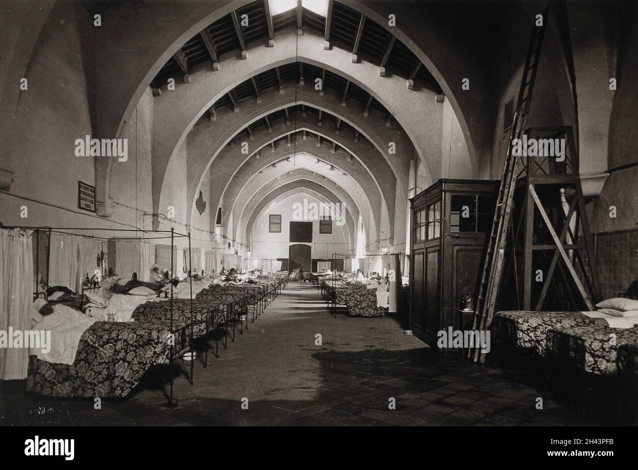 Hospital de la Santa Cruz, Barcelona: a ward. Photograph, ca.1900 Stock ...