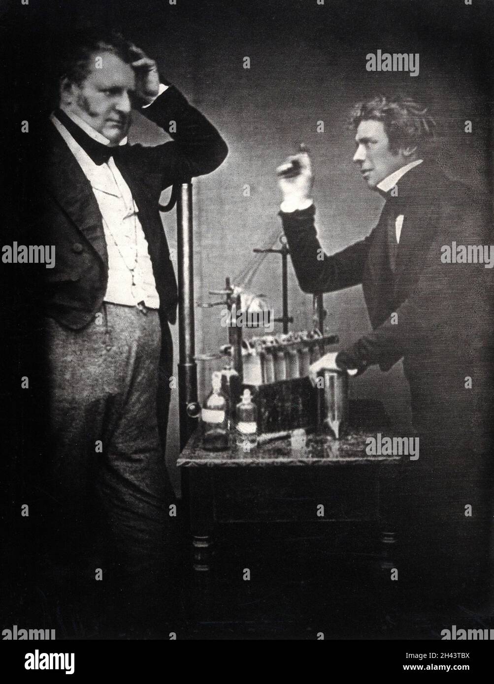 Michael Faraday (right) with John Frederick Daniell (inventor of the ...