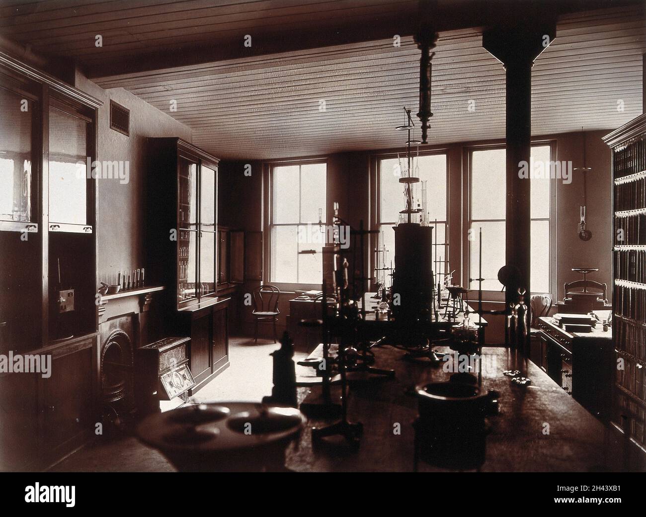 The interior of a pharmaceutical or chemical laboratory, with two long ...