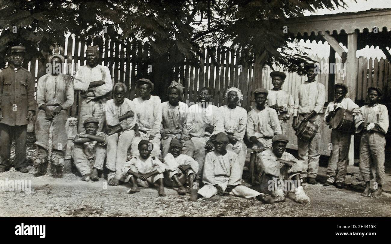 Leper asylum, Rat Island, Antigua: a group of male patients, some with ...