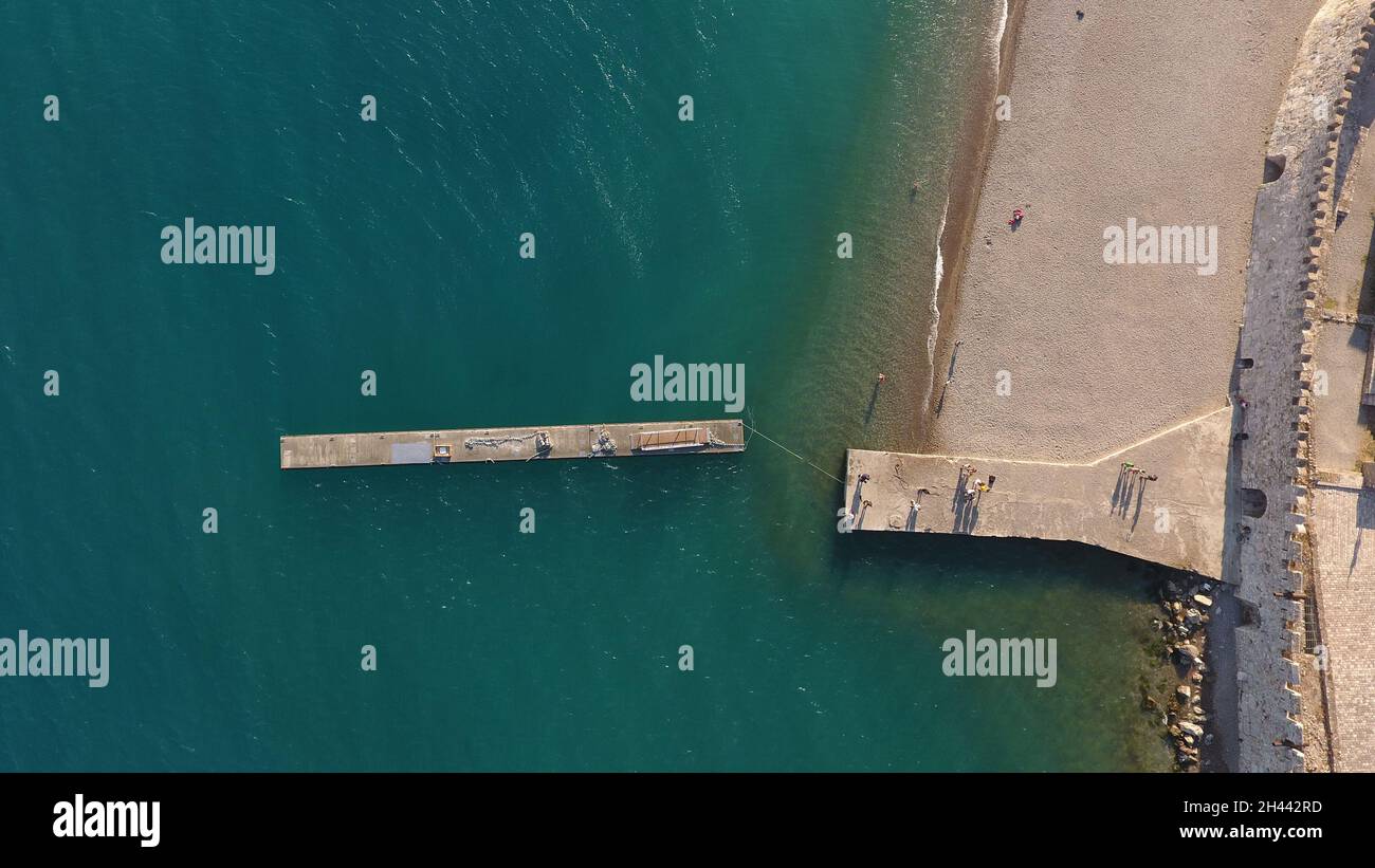 Aerial photo of floating pier next to venetian port of Nafpaktos in ...
