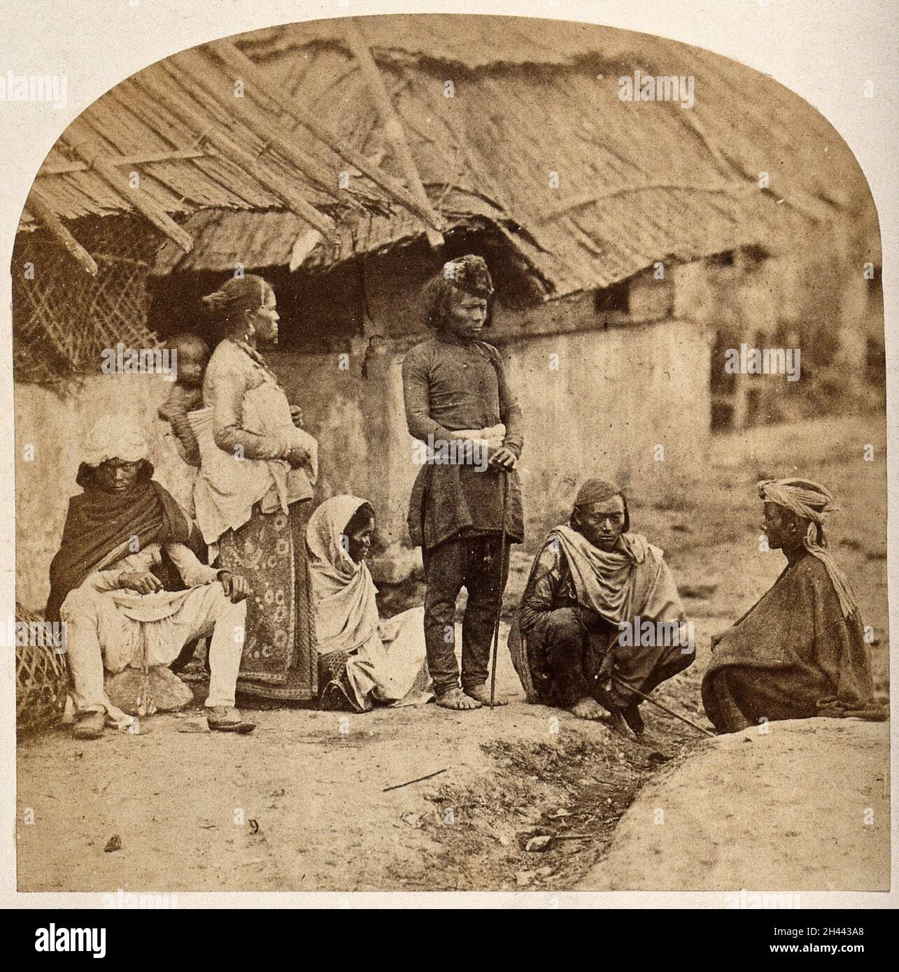 Nepal: Sunwar tribespeople outside a dwelling. Photograph by Clarence ...