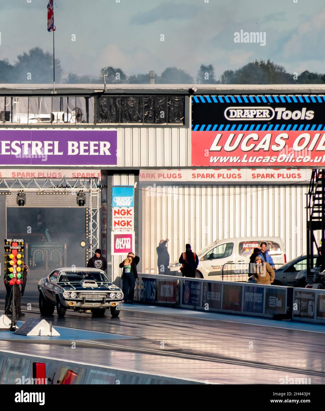 Classic Dodge charger American muscle car lining up on the start of the ...