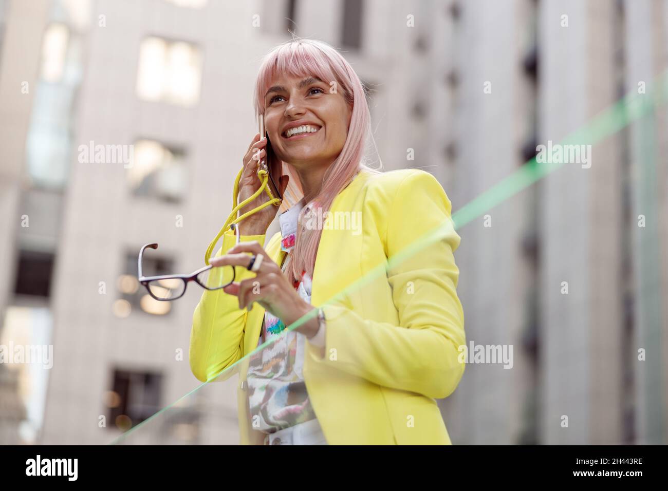 Joyful young woman talking hi-res stock photography and images - Alamy