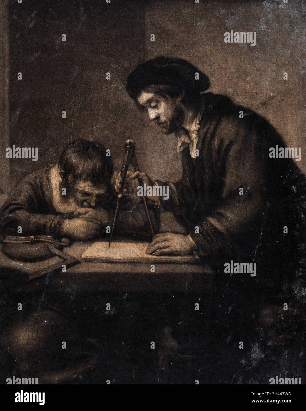 A mathematician, using dividers to measure a diagram on a piece of ...
