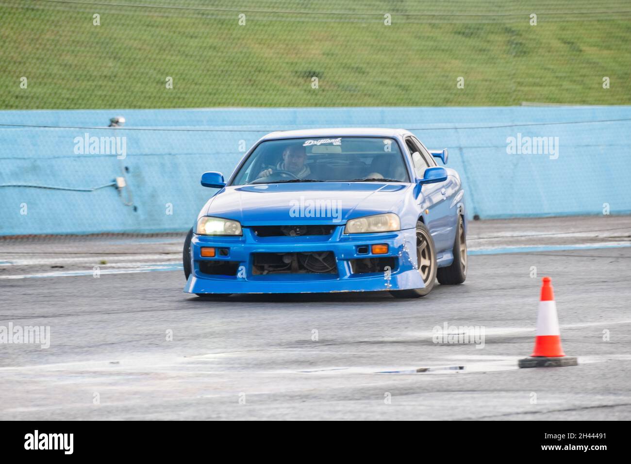 Classic rear wheel drive Nissan Skyline drifting at the Flame & Thunder ...