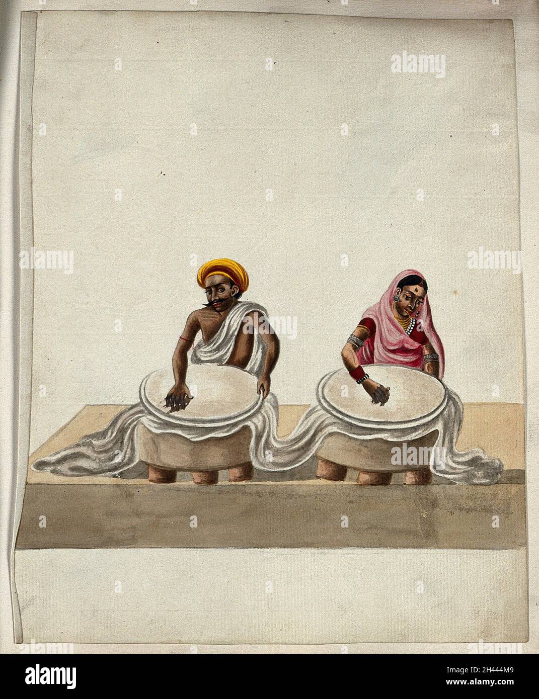 A man and a woman rubbing a piece of batik cloth (?). Gouache painting ...