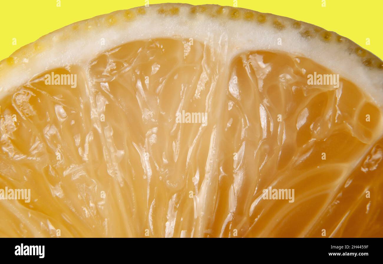 macro photo of slice of lemon. Abstract nature background Stock Photo ...