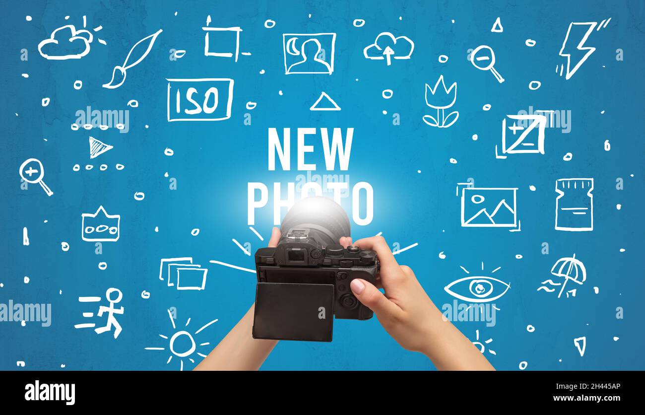 Hand taking picture with digital camera Stock Photo - Alamy