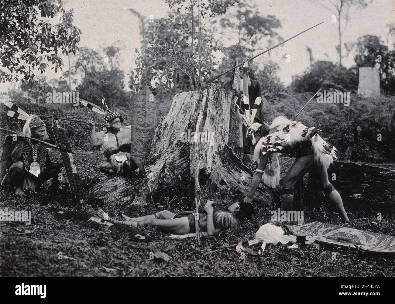 Sarawak: five native Kenyah warriors in a warfare ritual. Photograph ...