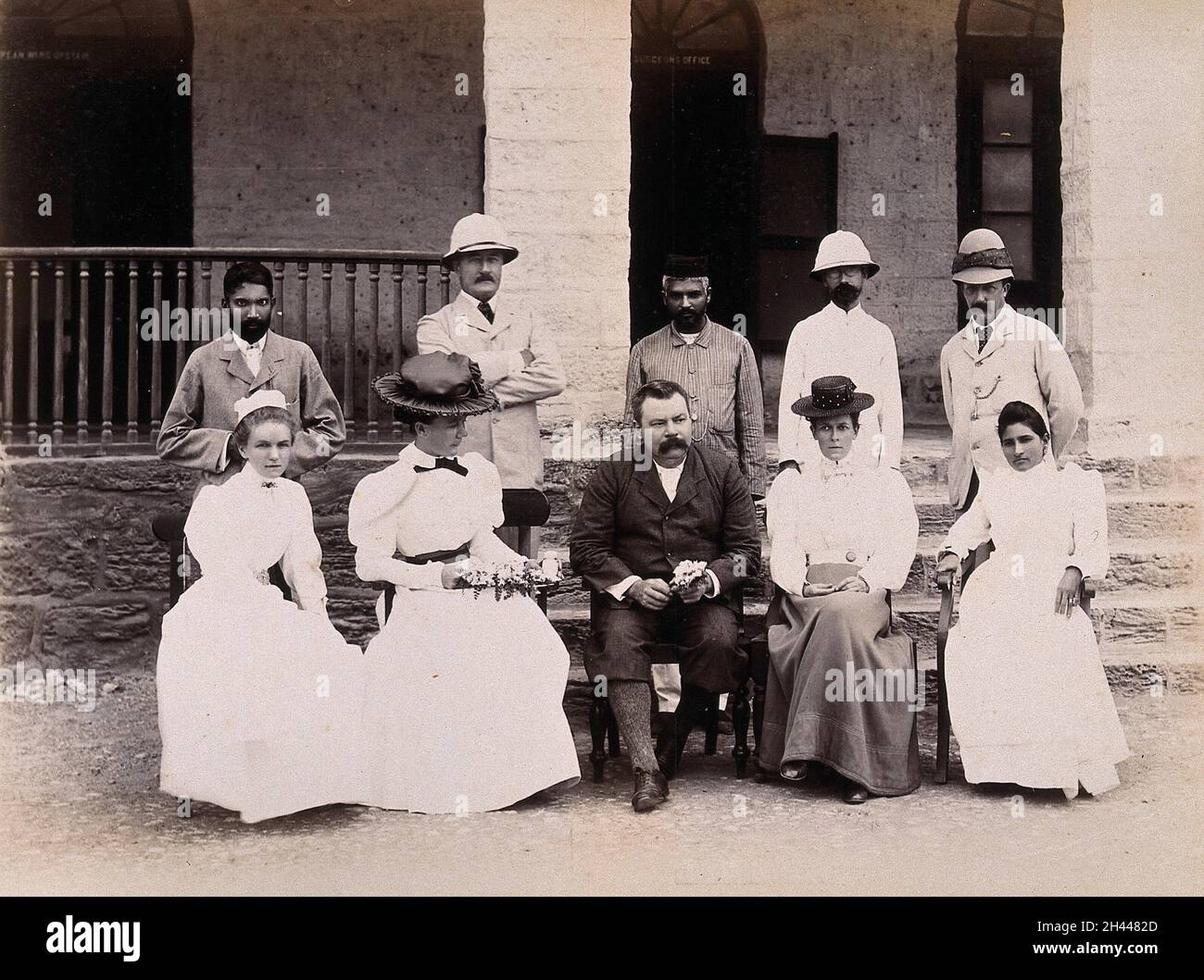 Group of people with a bouquet of flowers, during the outbreak of ...