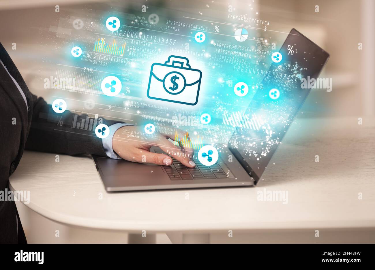Young man watching stock market on laptop Stock Photo - Alamy