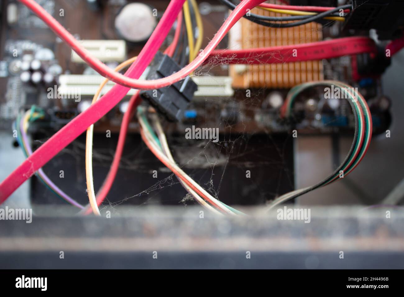 An old family computer filled with spider webs, dust and viruses ...