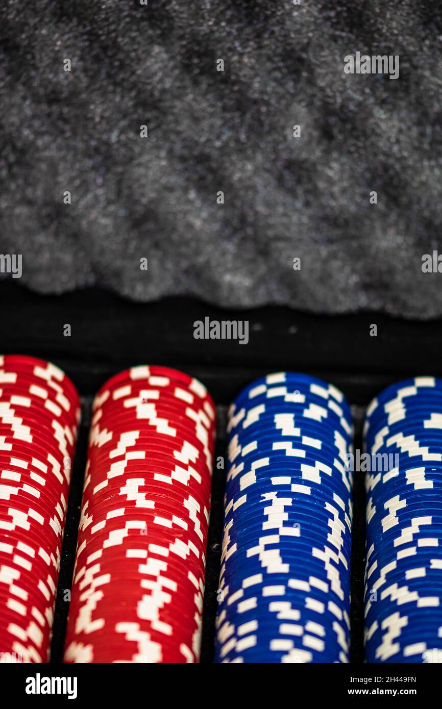 Stacks of poker chips detail with cards Stock Photo - Alamy