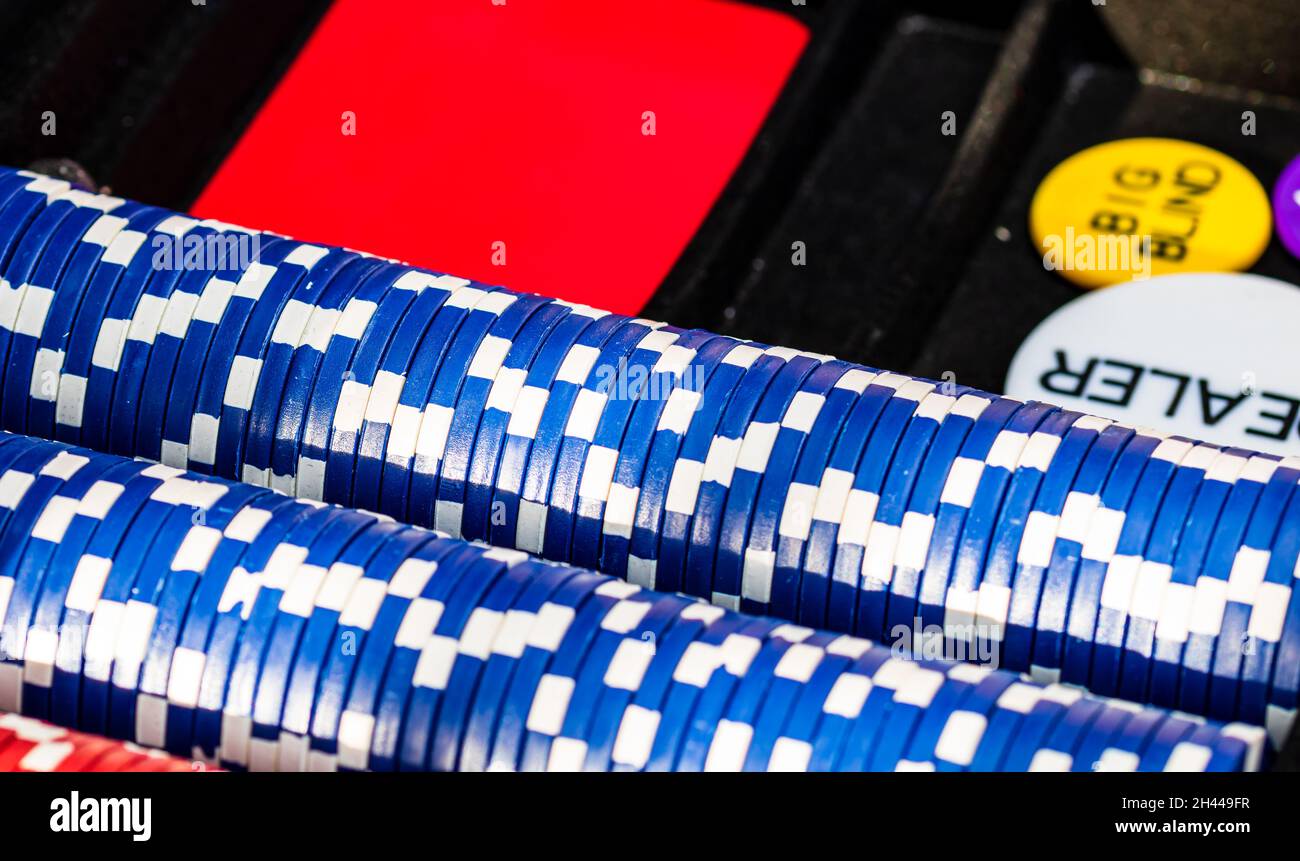 Stacks of poker chips detail with cards Stock Photo - Alamy