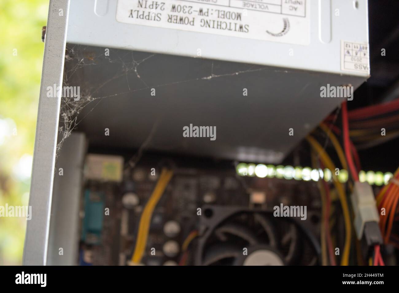An old family computer filled with spider webs, dust and viruses ...