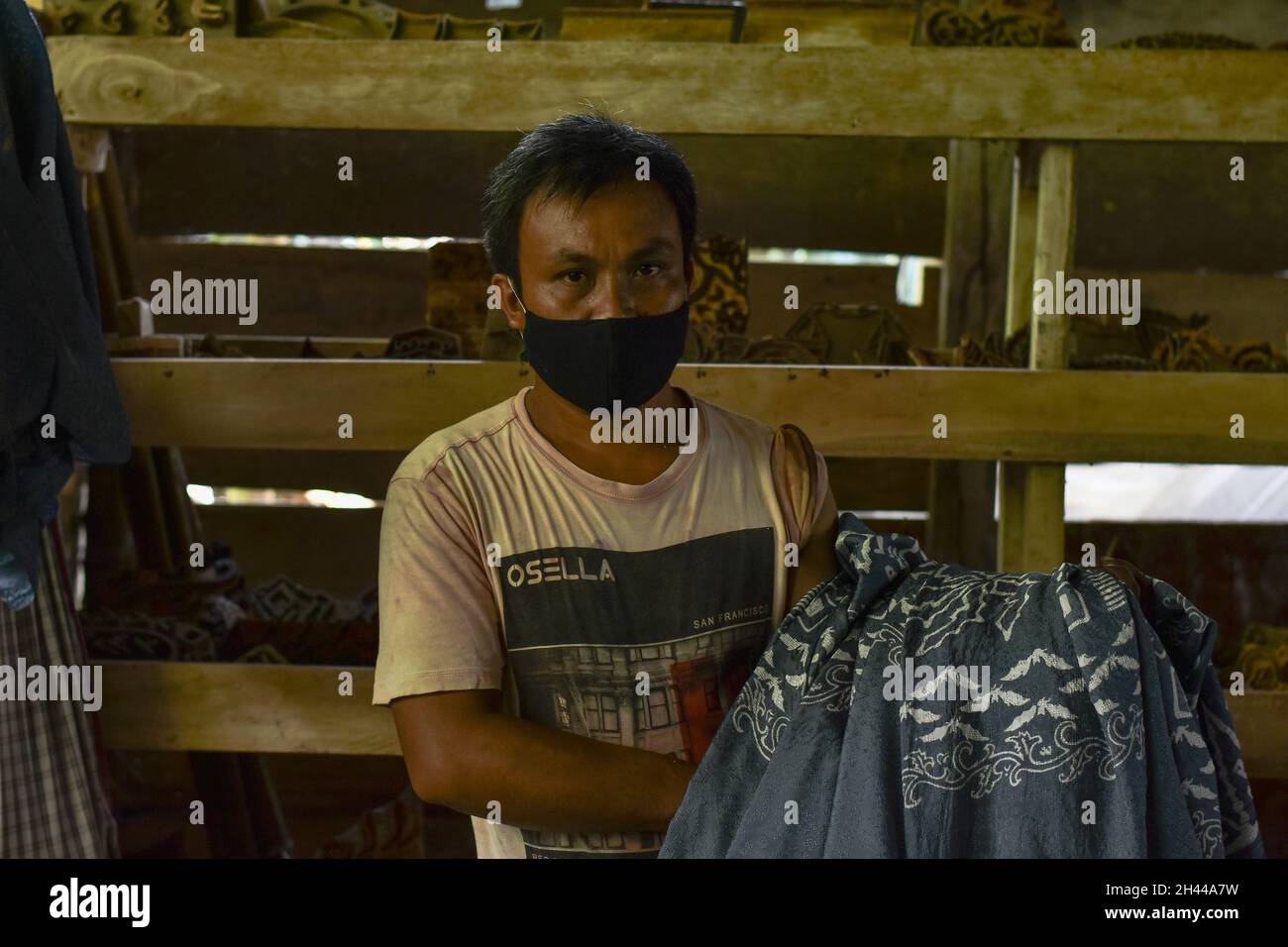 Soppeng, Indonesia. 31st Oct, 2021. A man is drying a typical Bugis ...