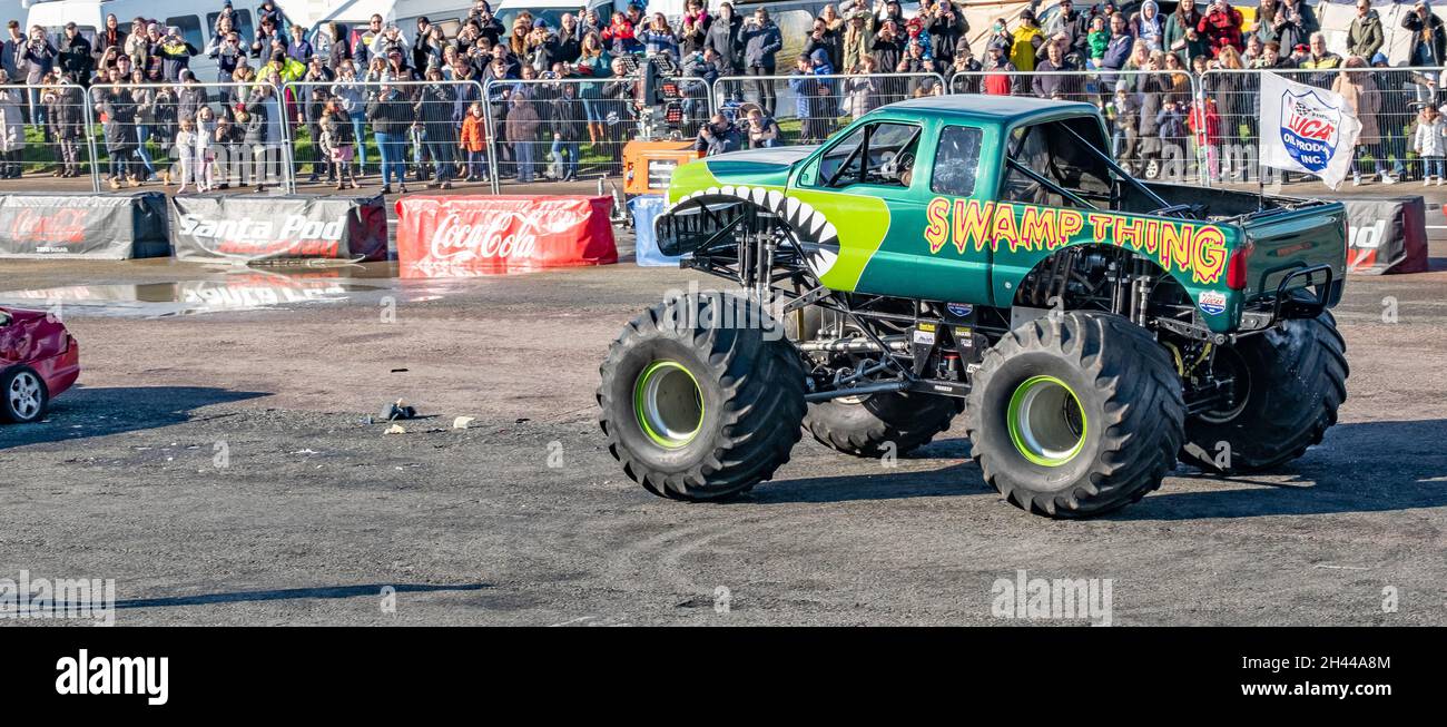 Swamp Thing monster truck crushing and jumping over cars at the Flame ...