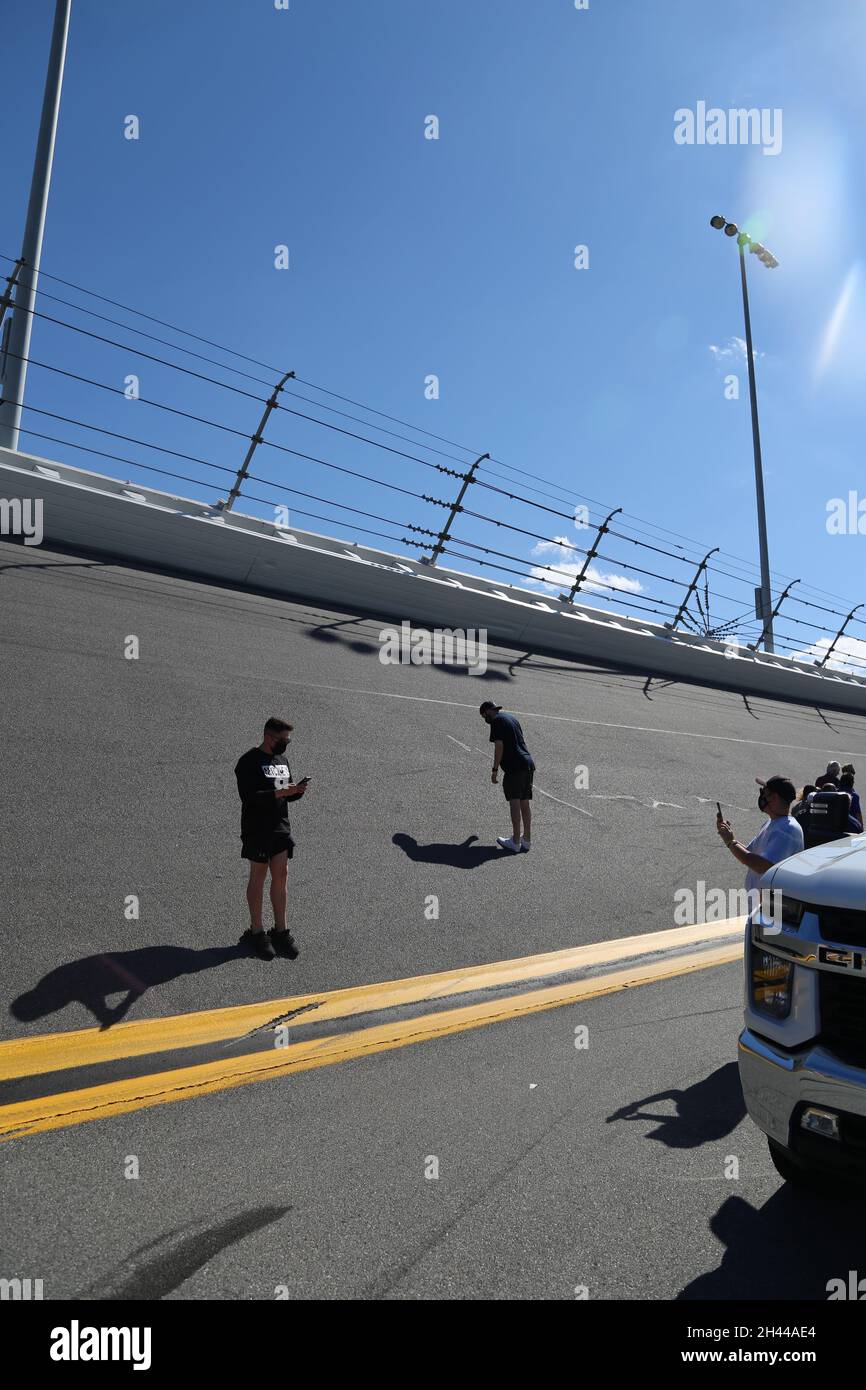 The banked turns at the Daytona International Speedway are steeper than ...