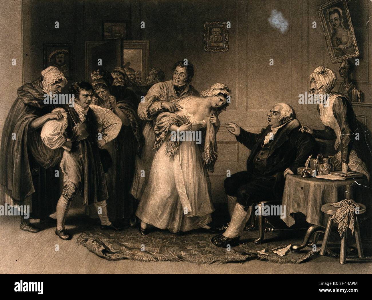 A matrimonial dispute: a young man looks aggressive as a young woman is ...