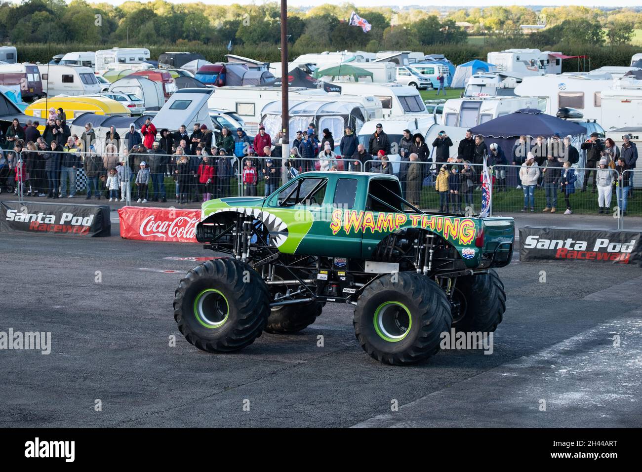 Swamp Thing monster truck crushing and jumping over cars at the Flame ...