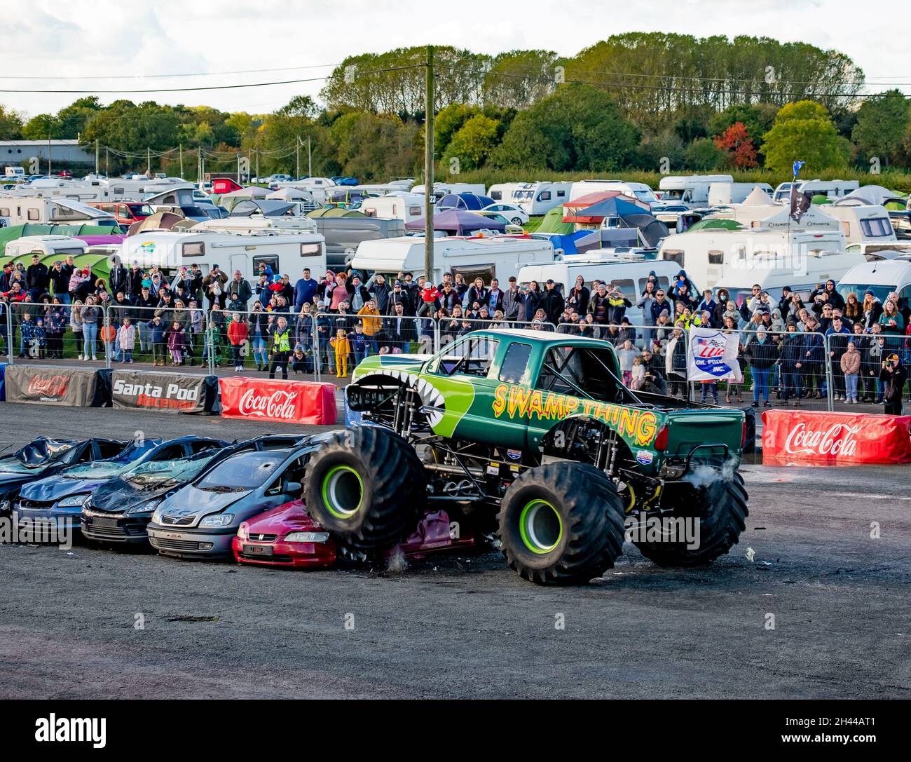 Swamp Thing monster truck crushing and jumping over cars at the Flame ...