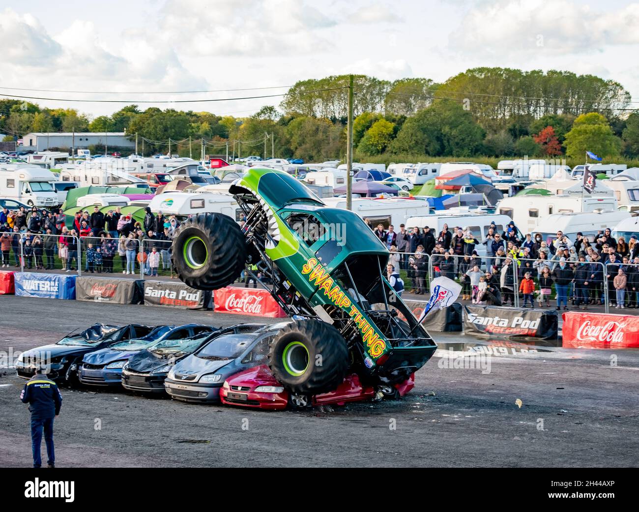 Swamp Thing monster truck crushing and jumping over cars at the Flame ...